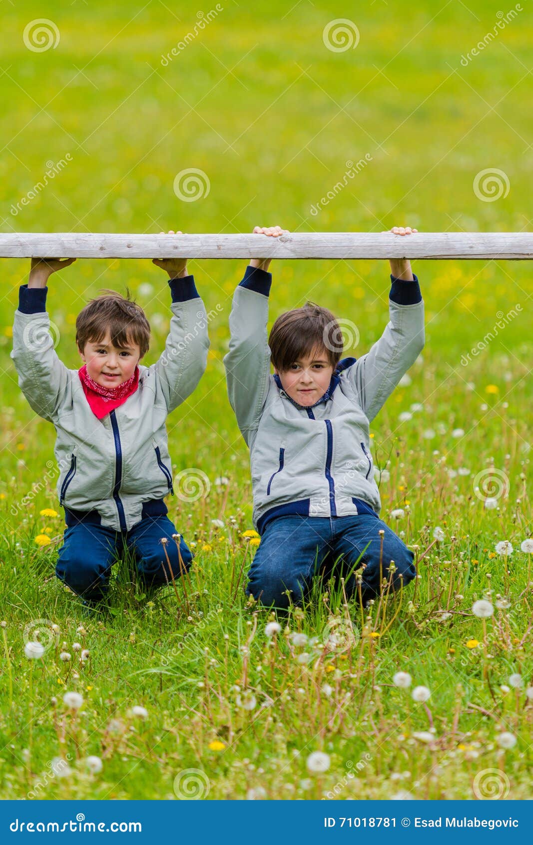 Two boys leaned on a fence stock image. Image of children - 71018781