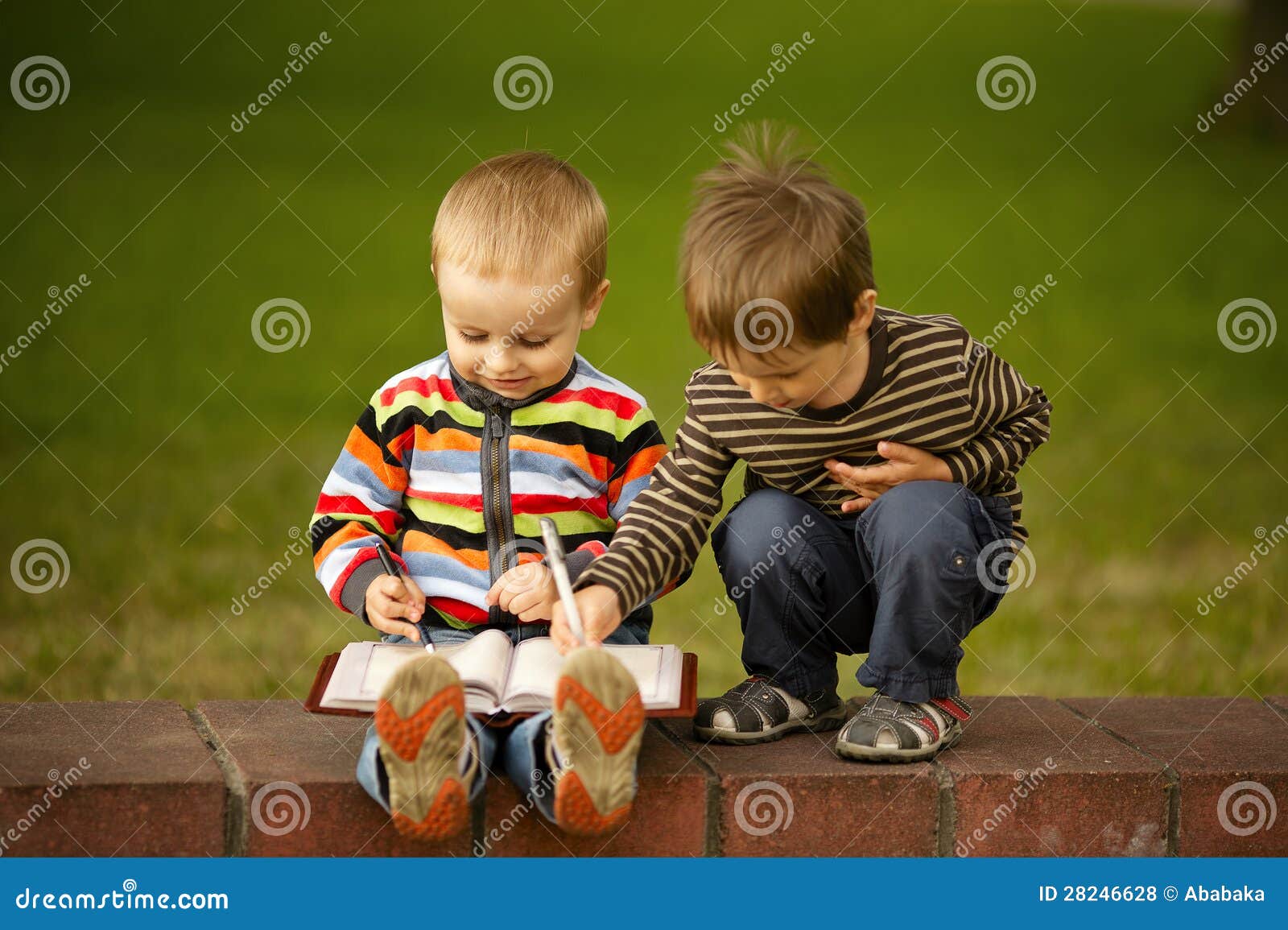 Two Boys Learn To Read and Write Stock Photo - Image of learn, friend ...