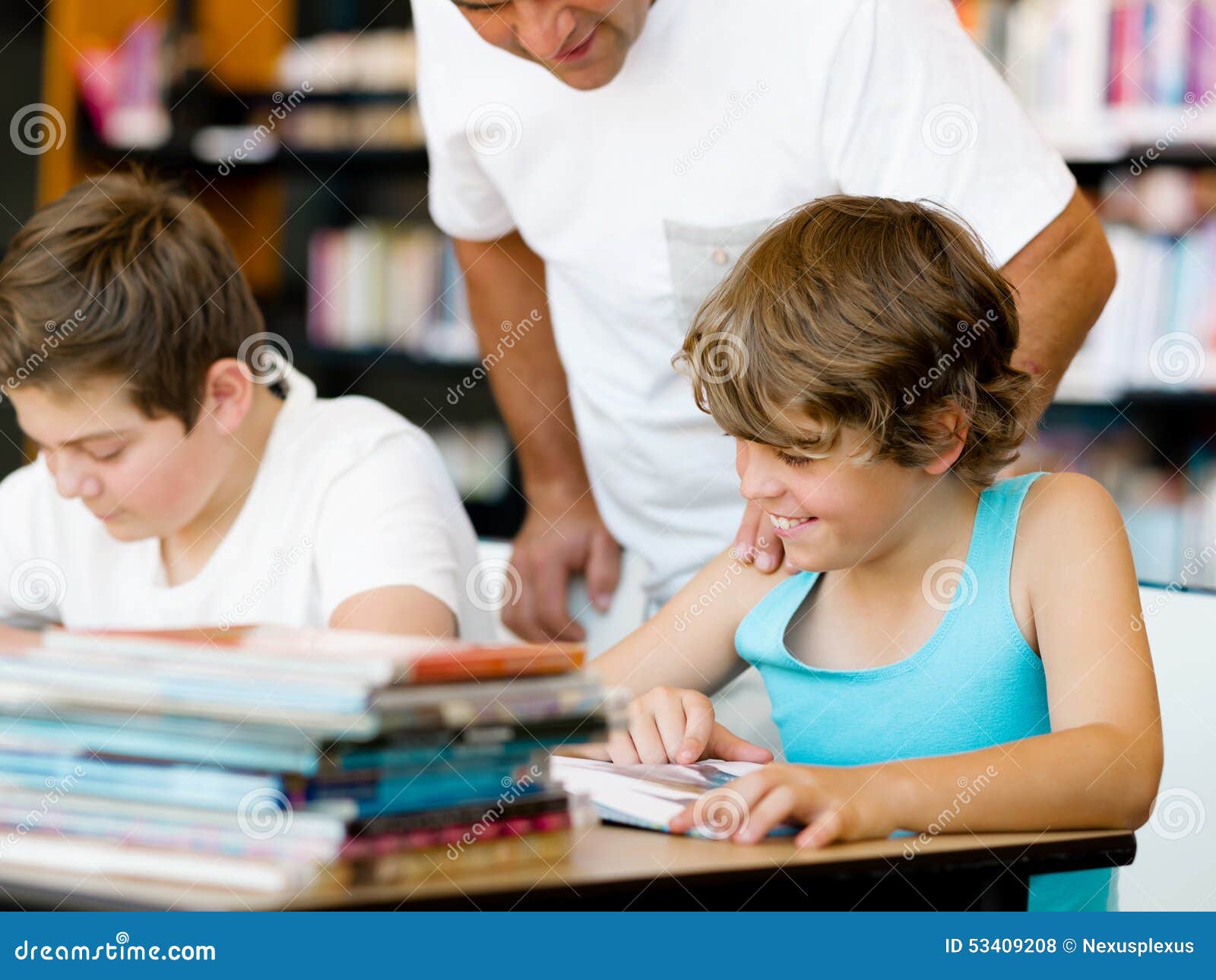 Two boys in library stock photo. Image of friends, friend - 53409208