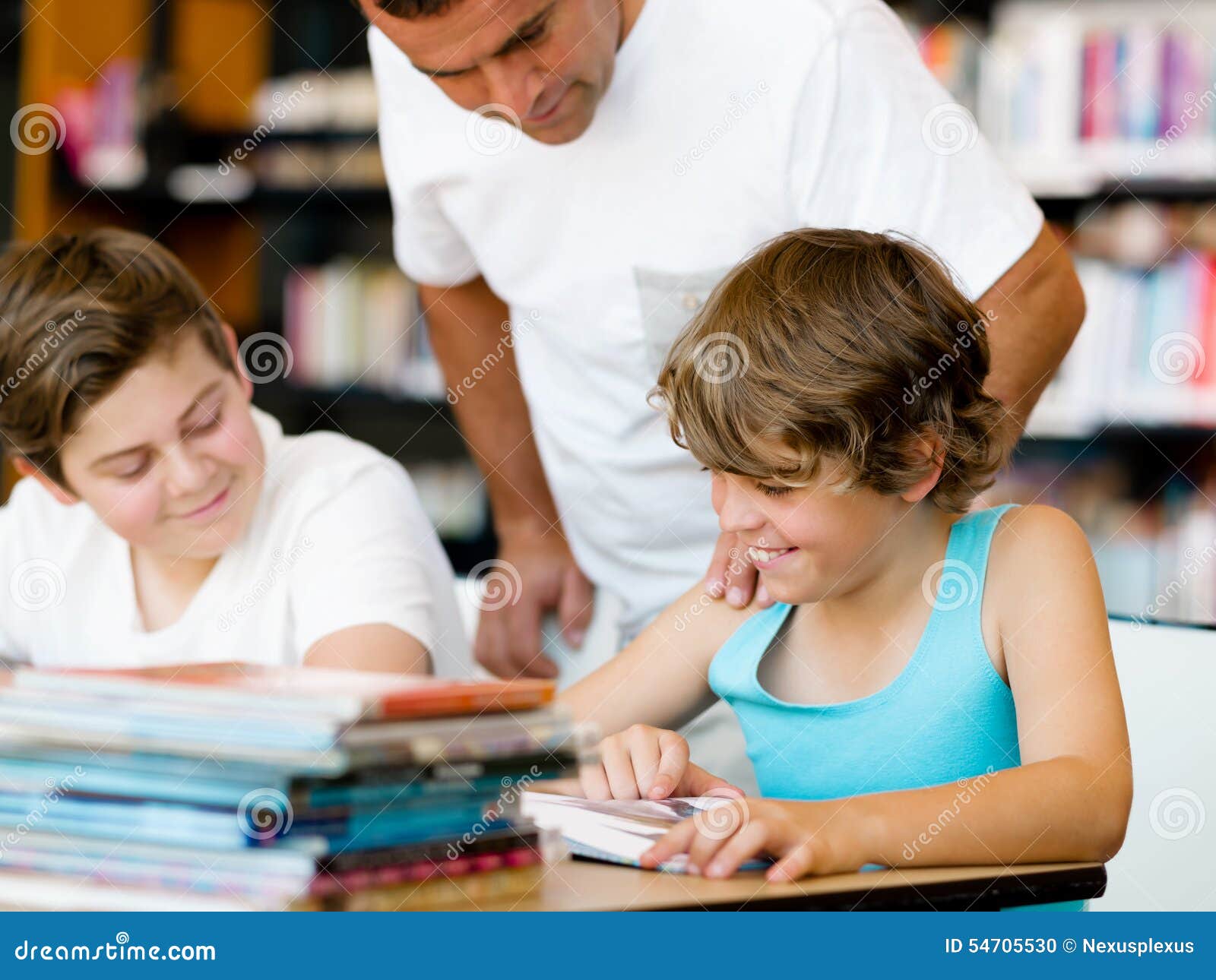 Two boys in library stock photo. Image of school, cheerful - 54705530