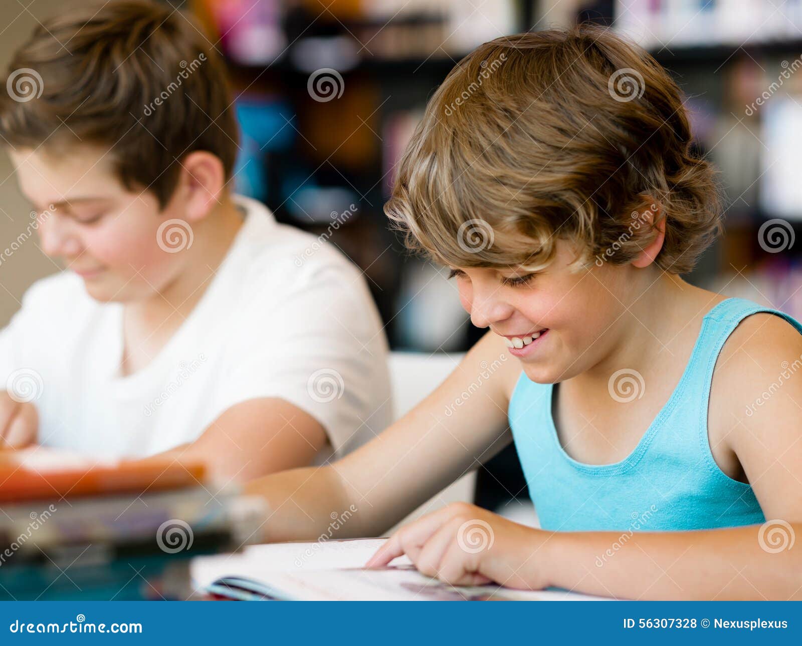 Two boys in library stock photo. Image of library, education - 56307328