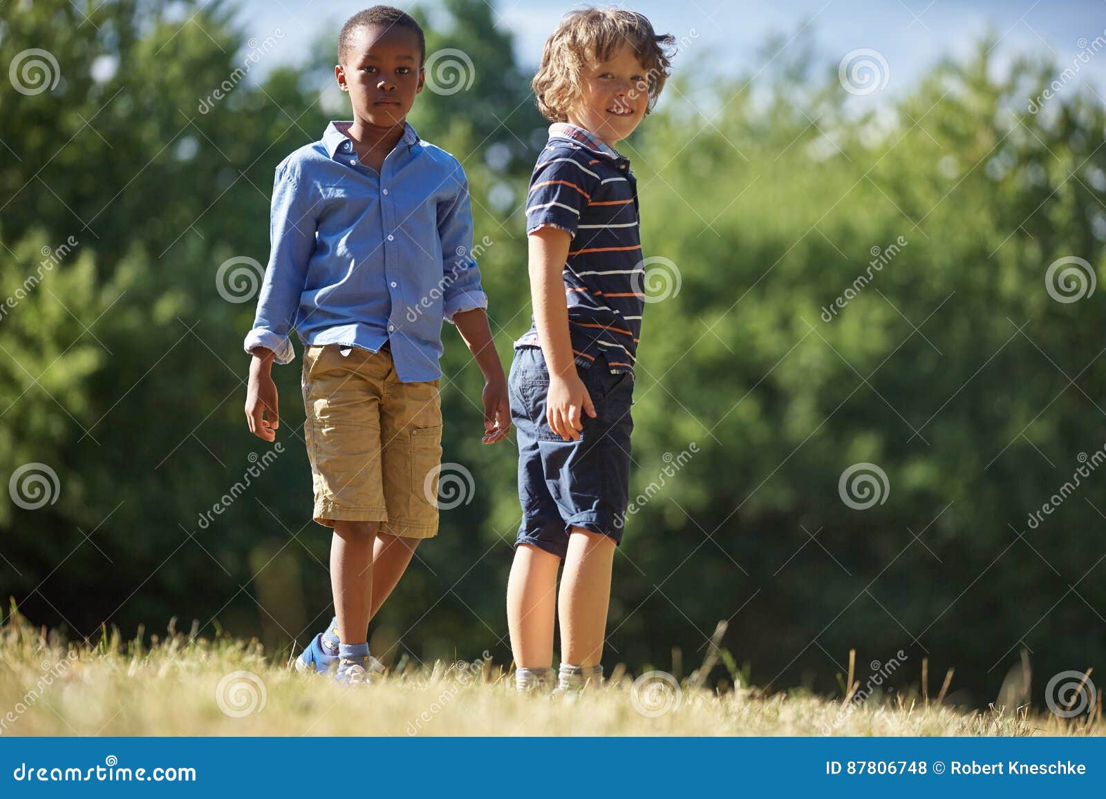 Two boys looking curious stock photo. Image of friendship - 87806748