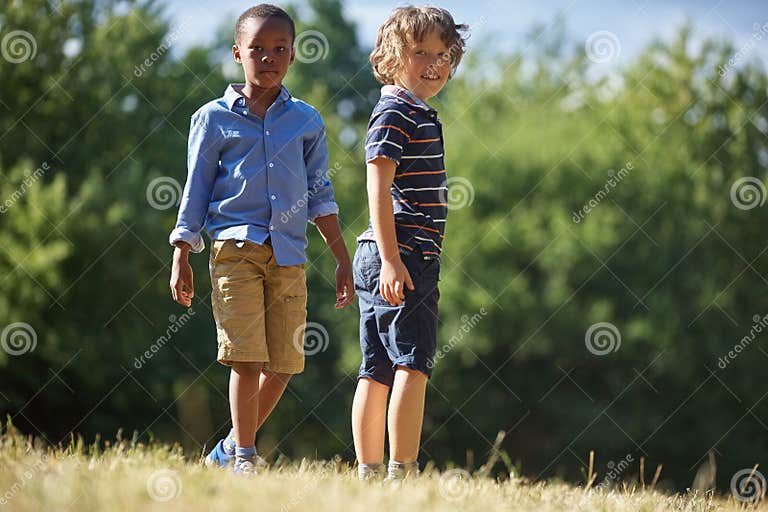 Two boys looking curious stock photo. Image of friendship - 87806748