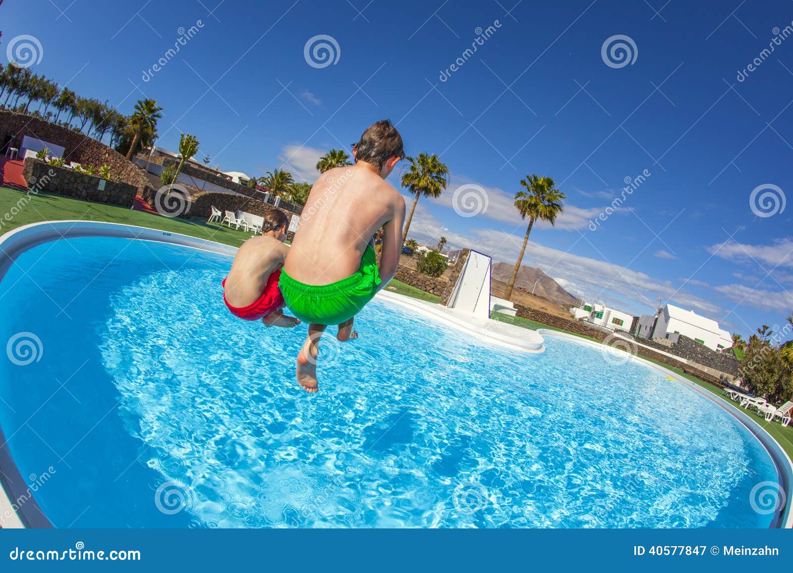 Two Boys Make a Cannonball into the Pool Stock Image - Image of happy ...
