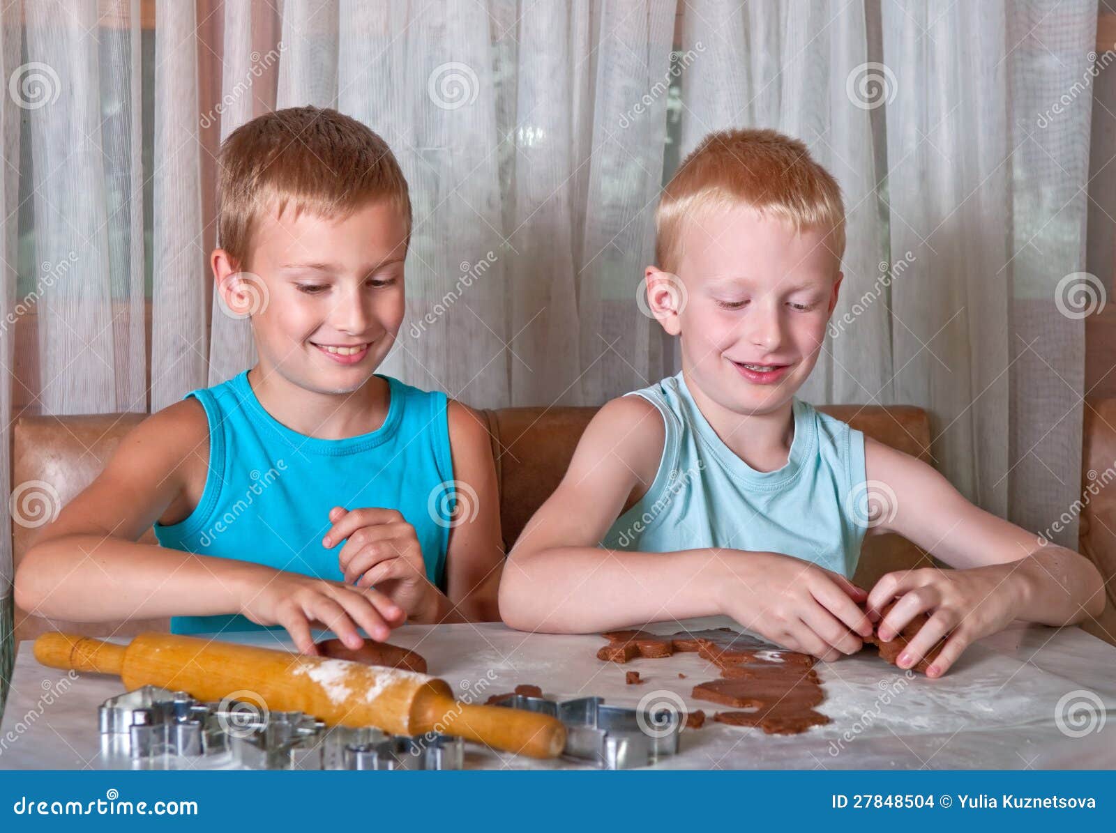 Two boys making cookies stock photo. Image of baking - 27848504