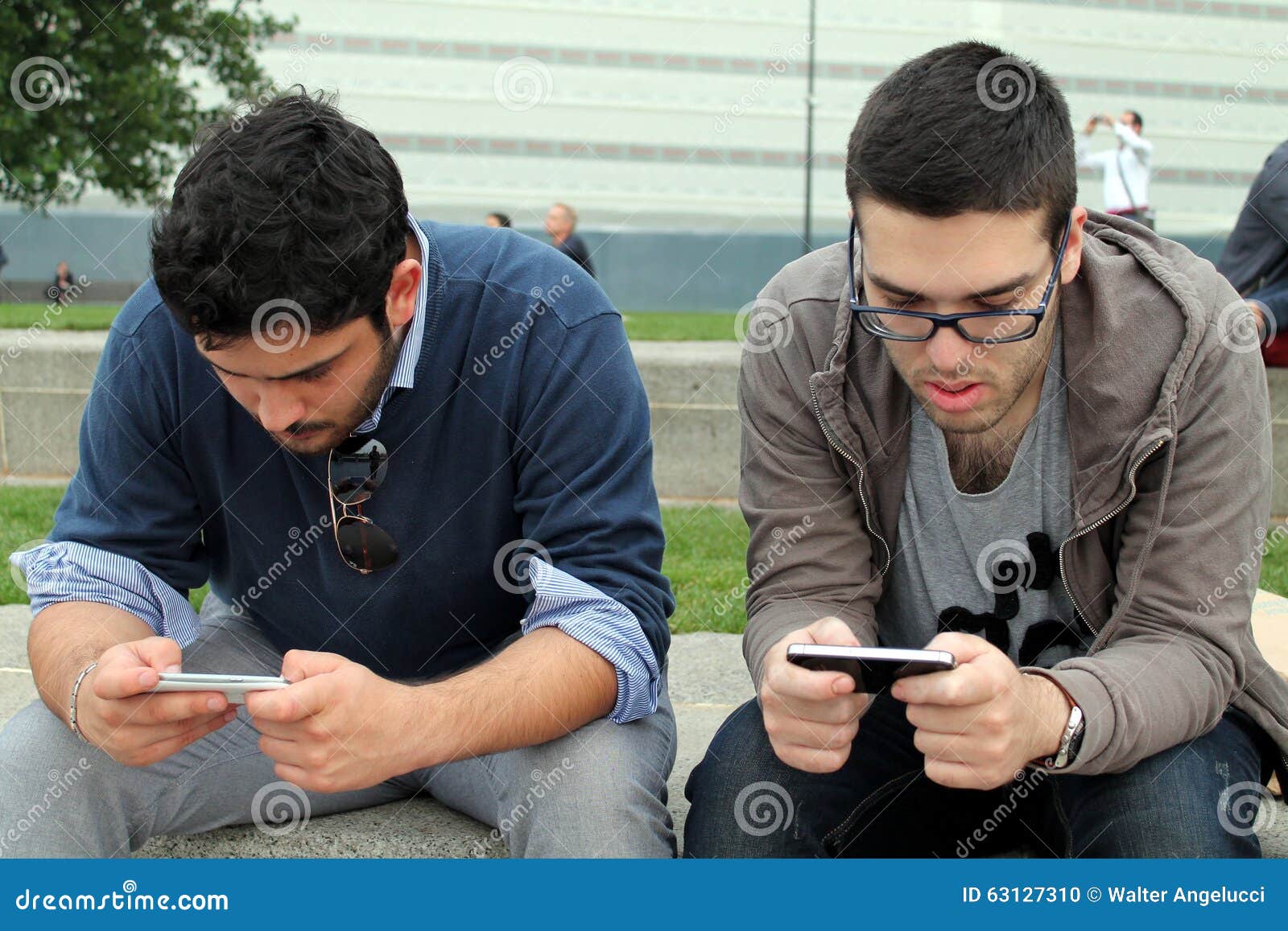 Two Boys Play with the Phone Editorial Image - Image of bank, phone ...