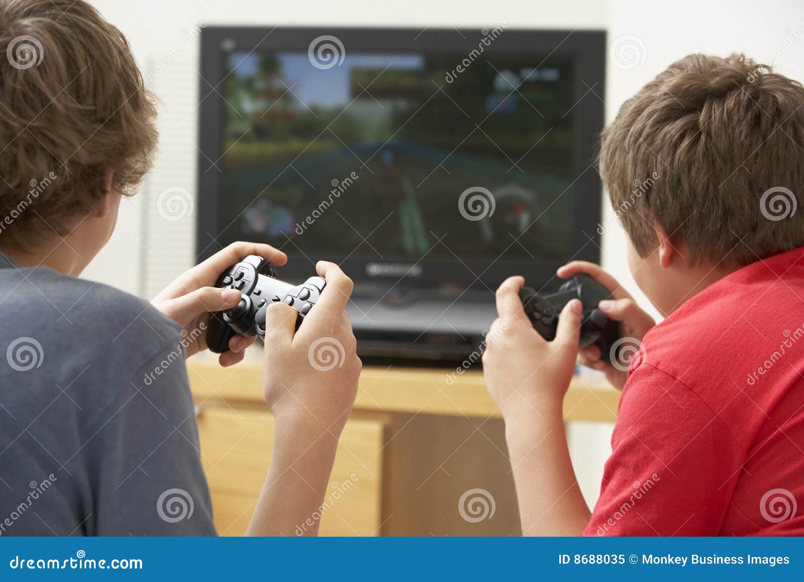 Two Boys Playing with Game Console Stock Image - Image of living ...