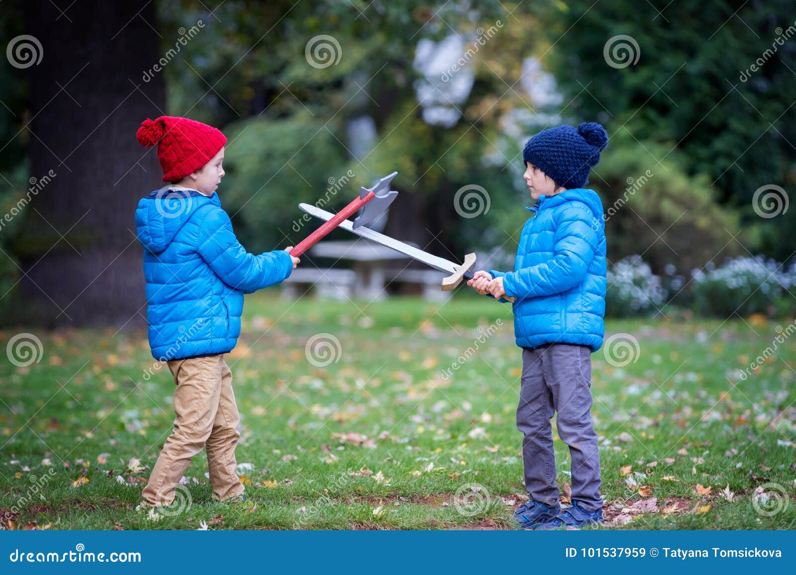 Two Boys, Playing with Swords in the Park Stock Image - Image of ...