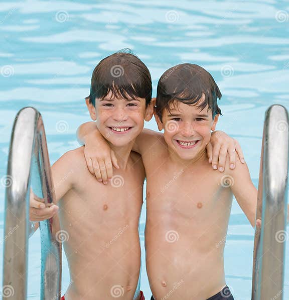 Two Boys at the Pool stock image. Image of childhood, happiness - 5613089