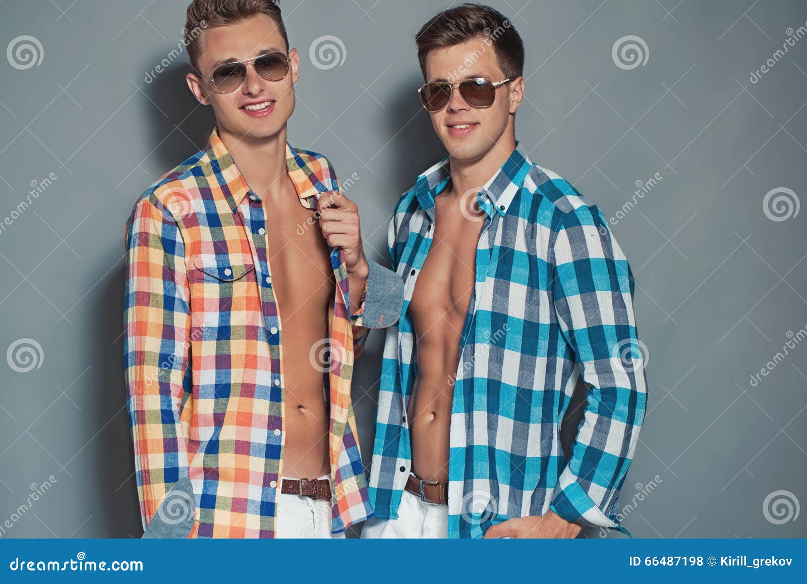Two boys posing in studio stock photo. Image of attractive - 66487198