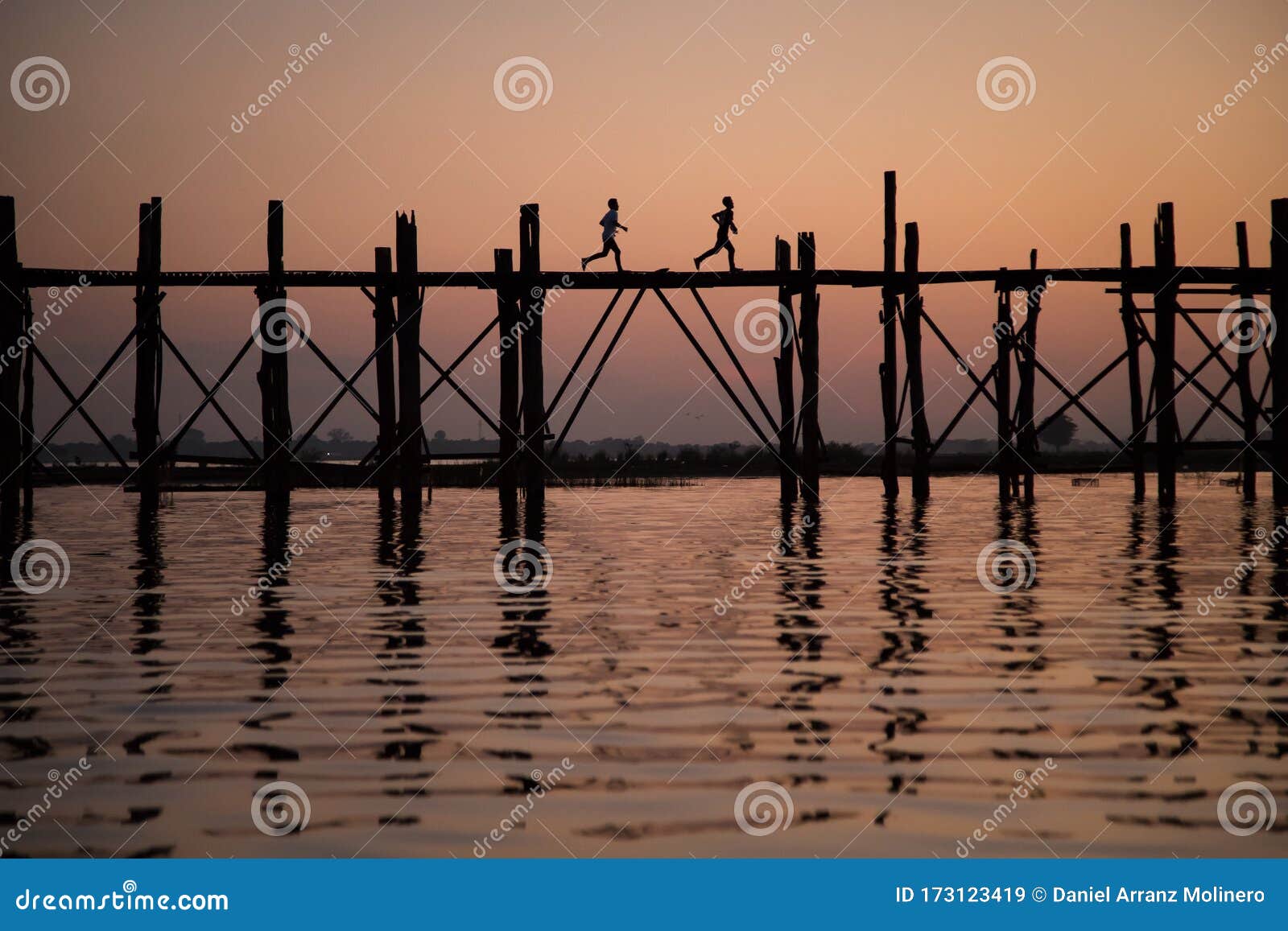 Two boys running in bridge stock image. Image of footbridge - 173123419