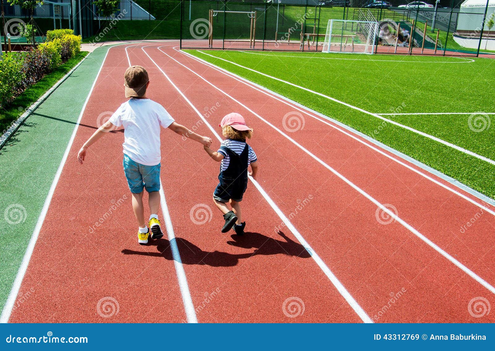 Two Boys Running stock image. Image of playful, life - 43312769