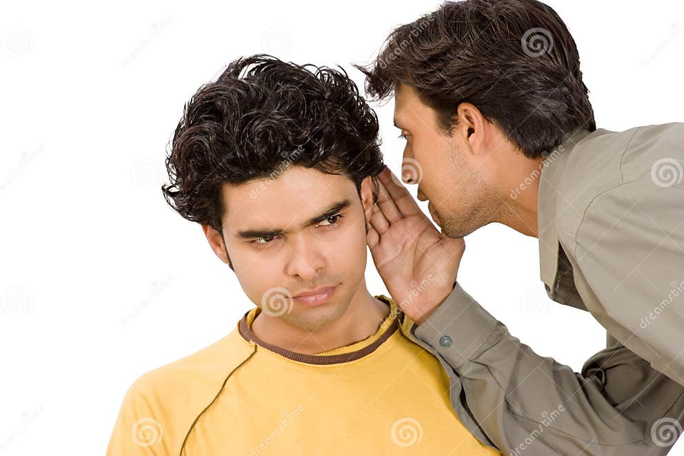 Two boys sharing secrets stock image. Image of guidance - 9559337