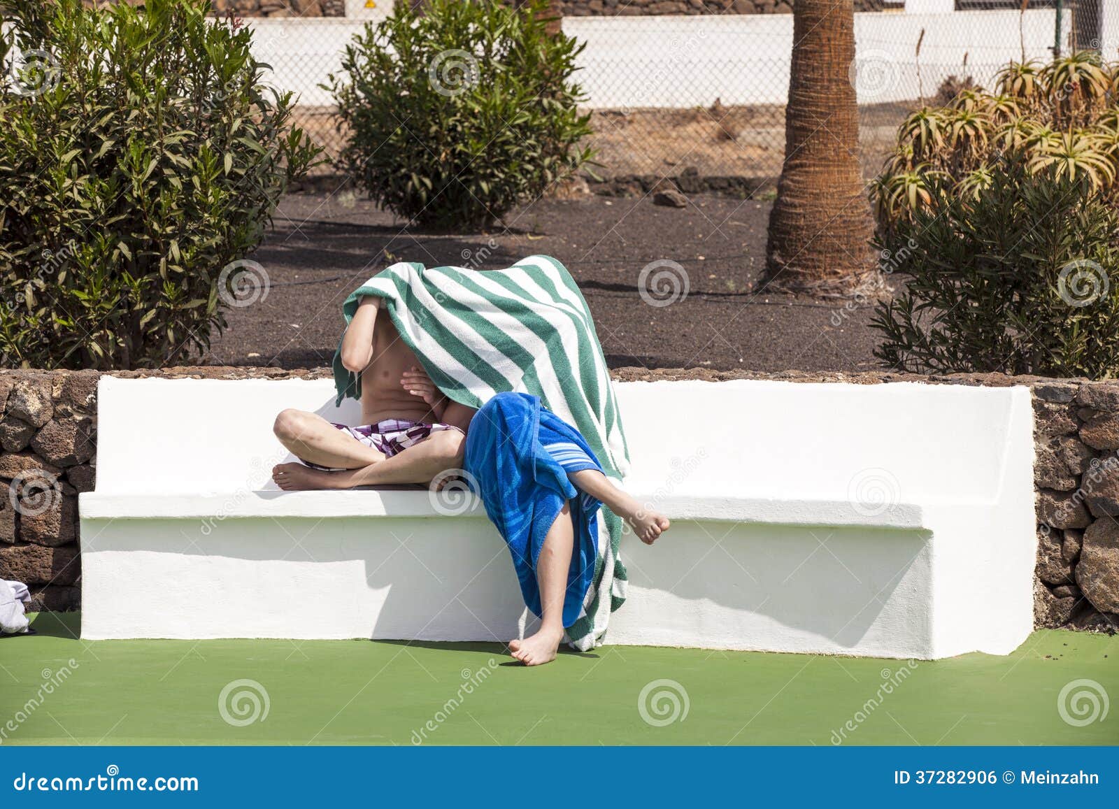 Two Boys Sitting on a Bench at the Pool Stock Photo - Image of little ...