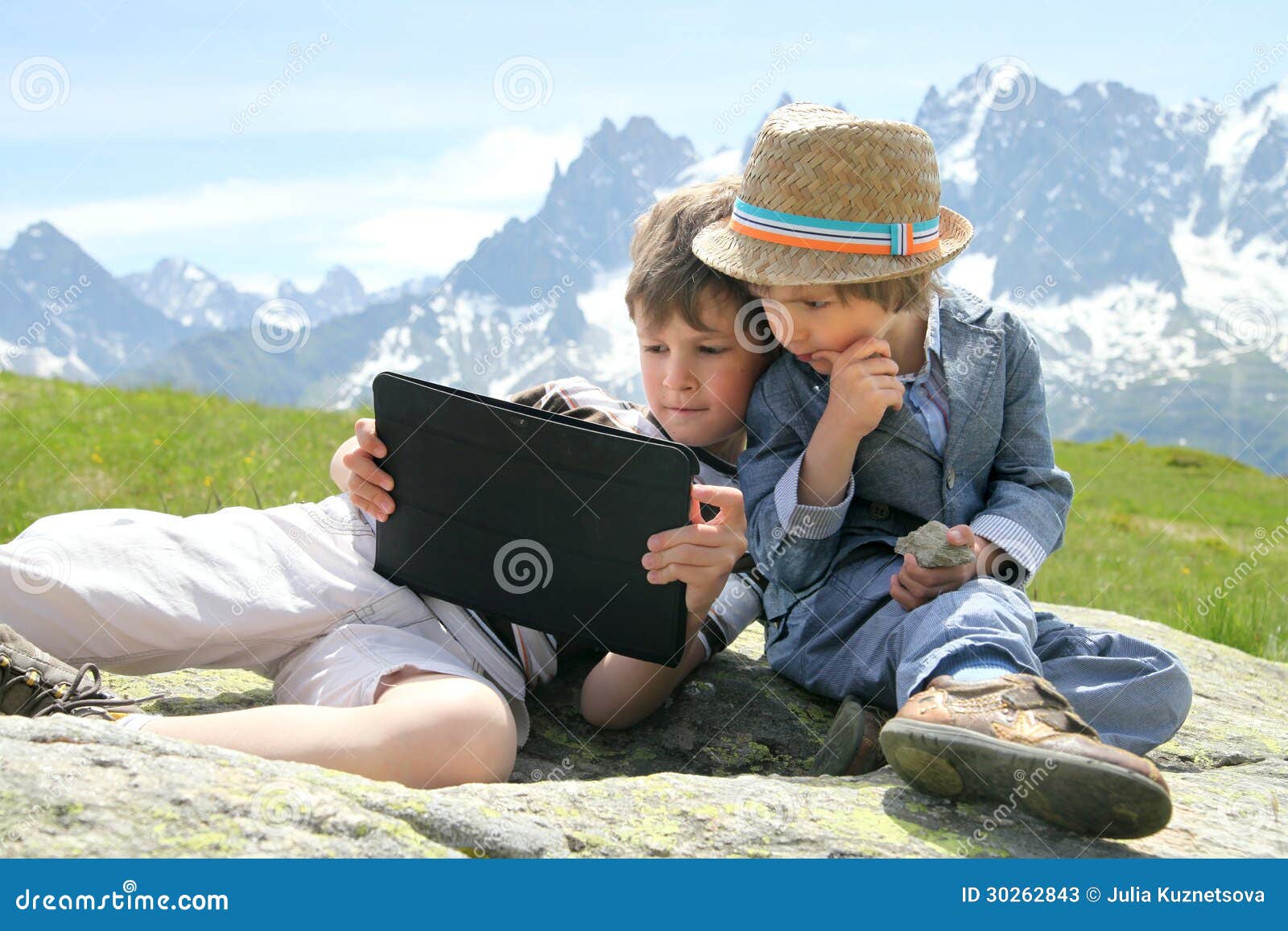 Two Boys with Tablet PC in Mountains Stock Image - Image of peak ...