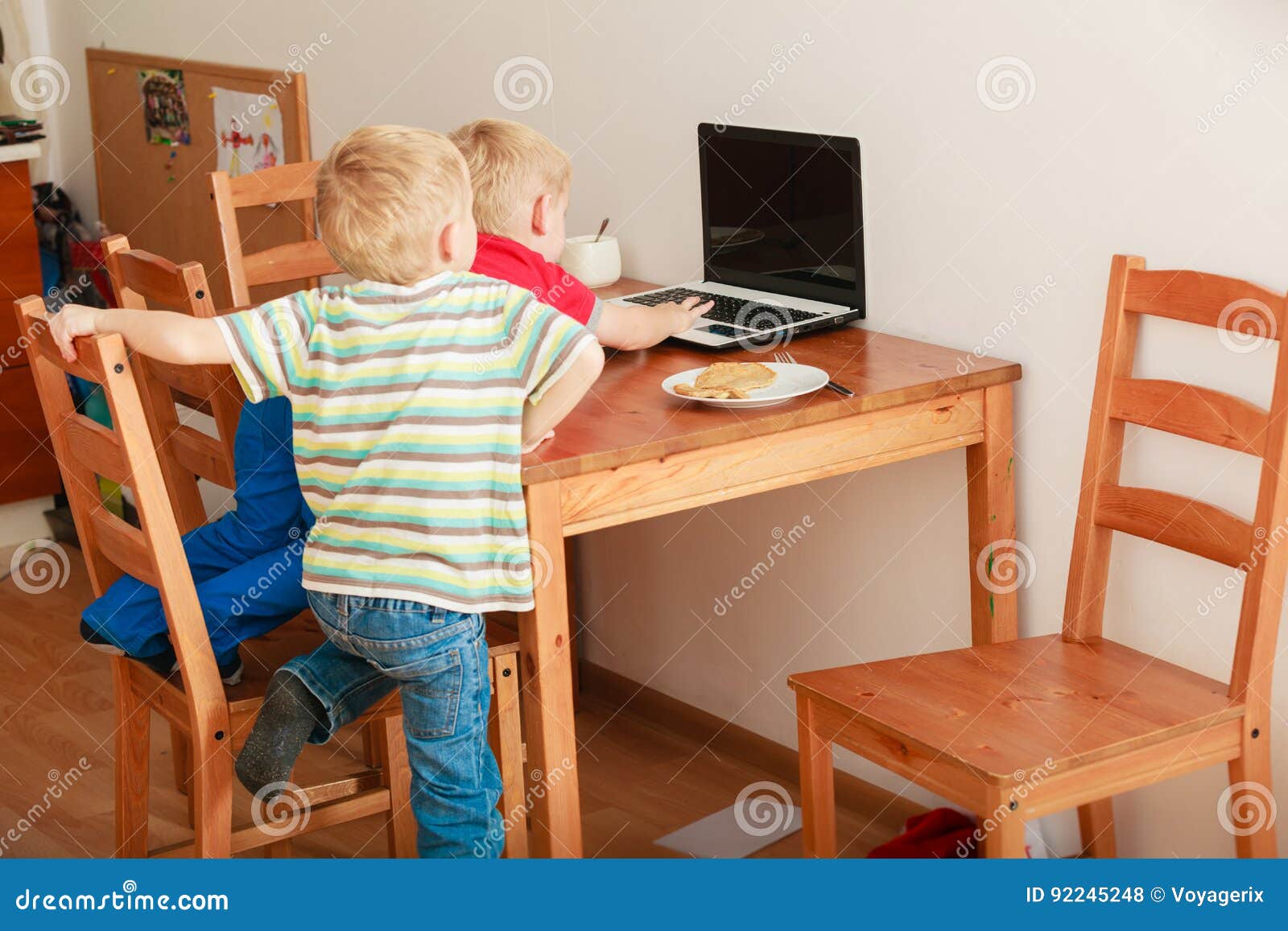 Two Boys Using Laptop Computer Playing Games Stock Photo - Image of ...