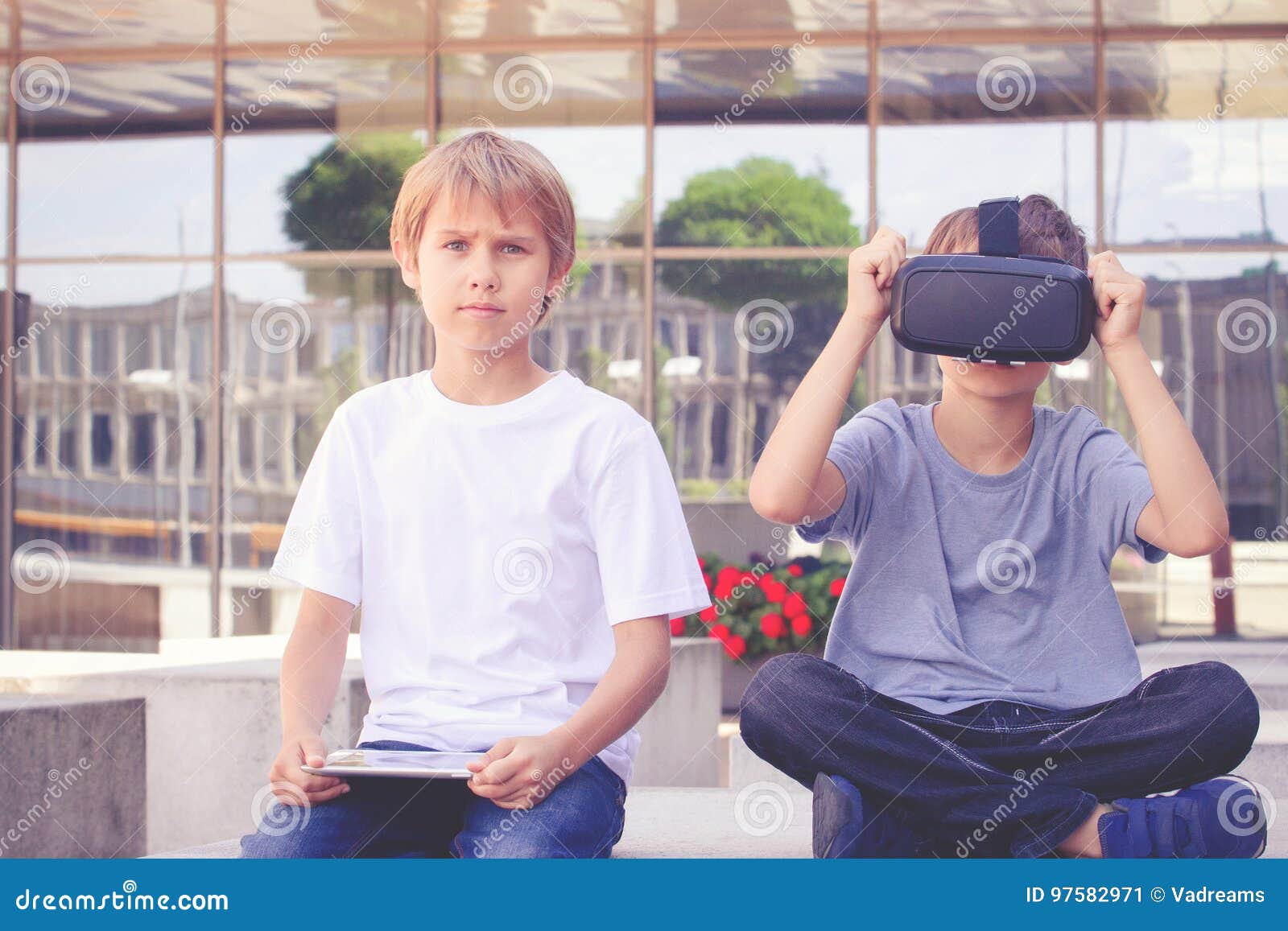 Two Boys with Virtual Reality Goggles and Tablet Computer Stock Image ...