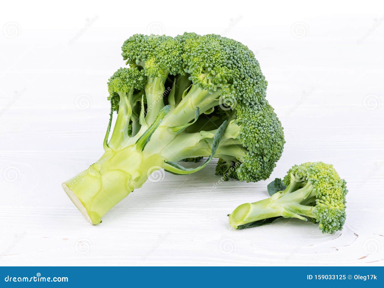 Two Branches of Fresh Broccoli on a White Table Stock Image - Image of ...