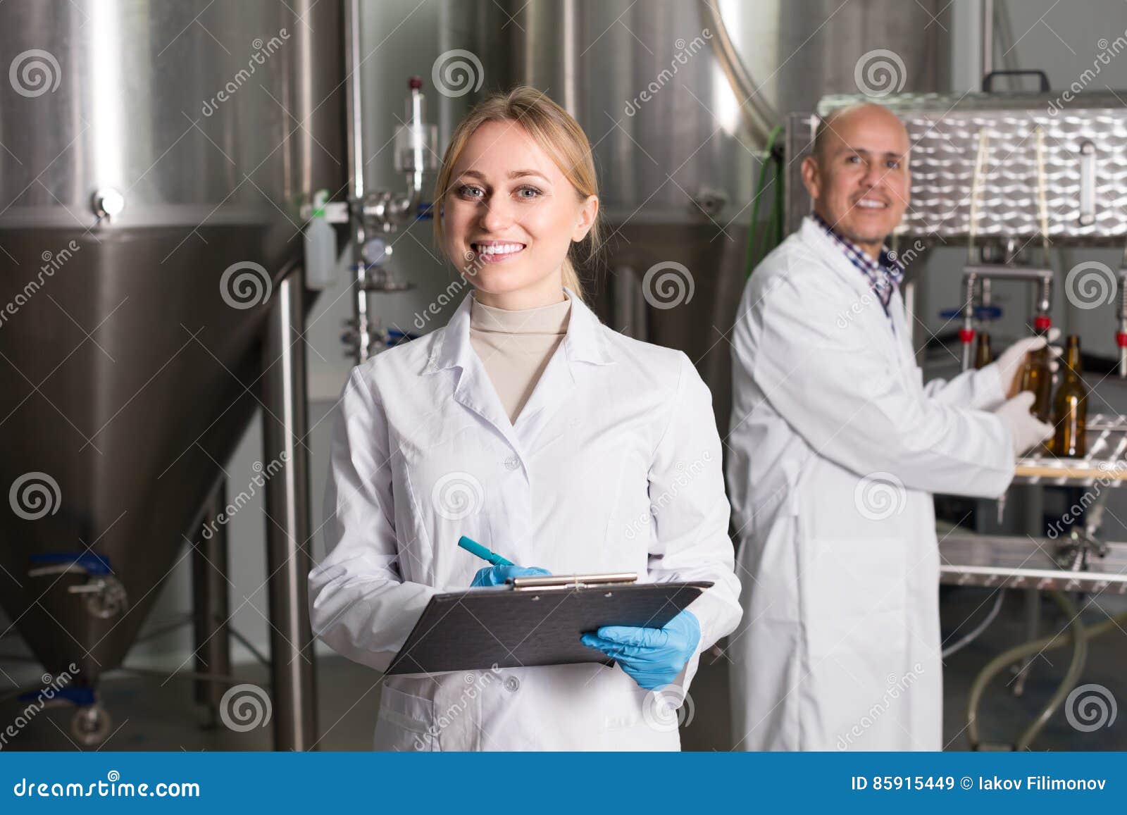 Two Brewery Workers on Beer Factory Stock Image - Image of bottling ...