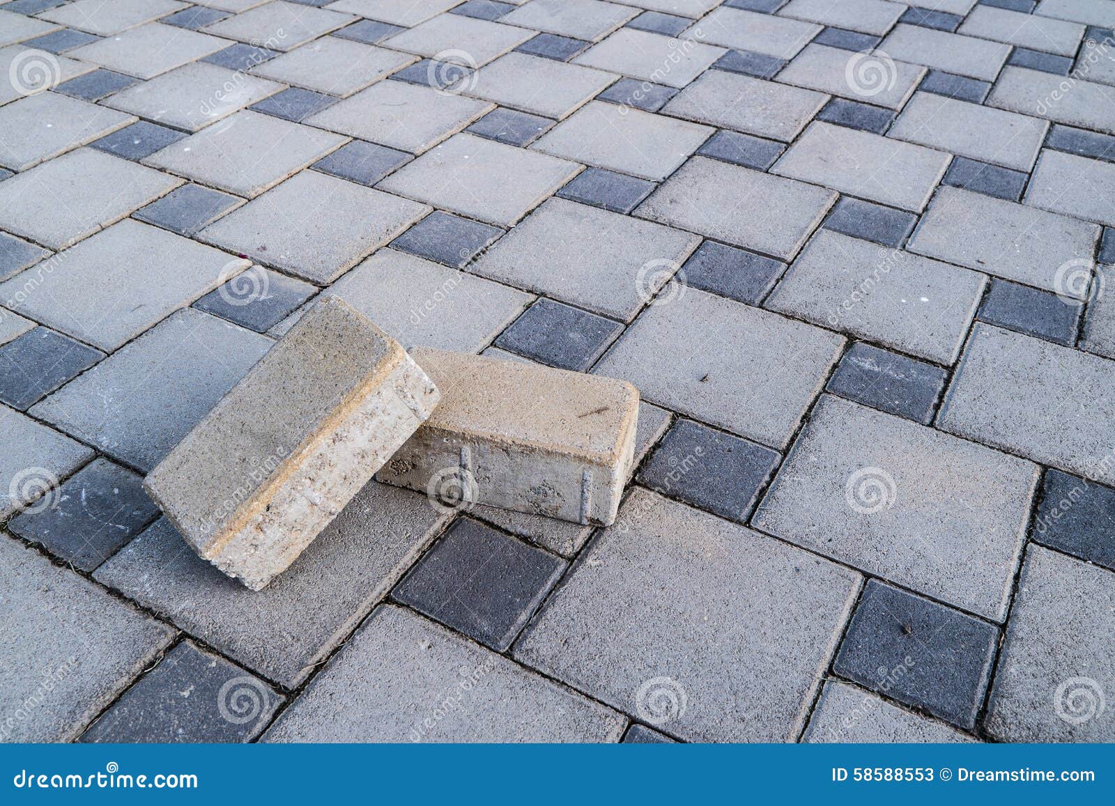 Two bricks and pavement stock image. Image of gray, bricks - 58588553