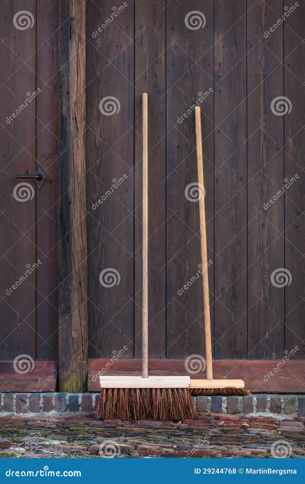 Two Brooms in Front of an Old Barn Stock Photo - Image of home ...