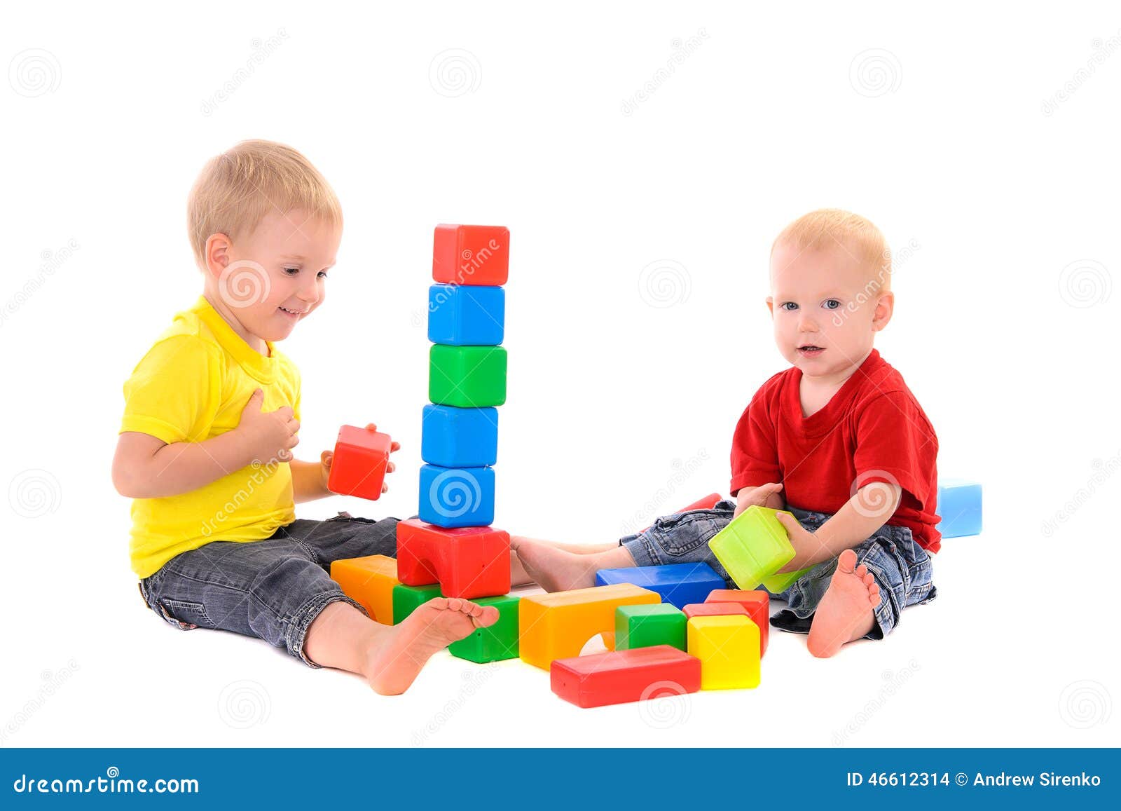 Two Brothers Build Toy Building of Colored Cubes Stock Photo - Image of ...