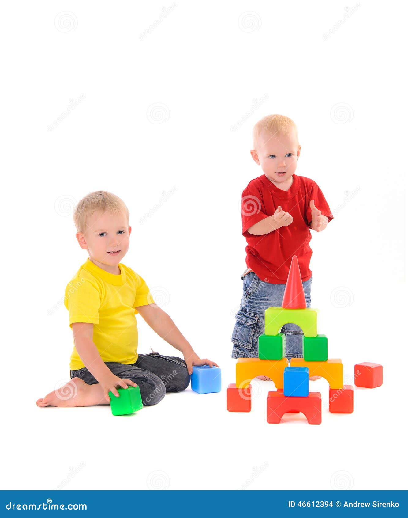 Two Brothers Build Toy Building of Colored Cubes Stock Photo - Image of ...