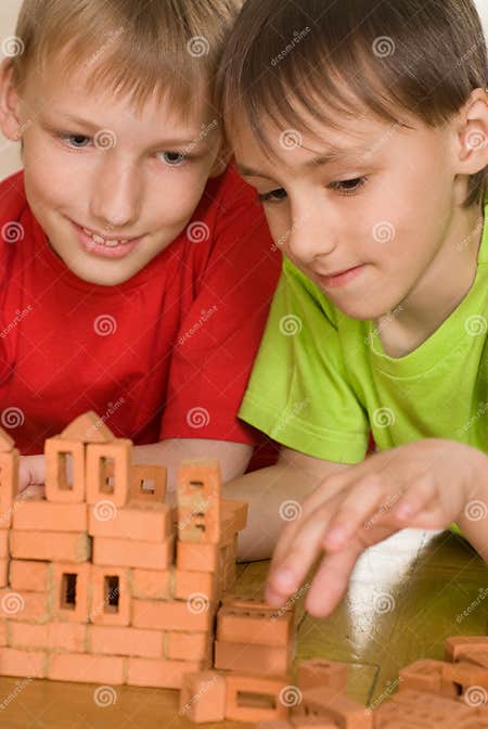 Two brothers are building stock image. Image of friendship - 15181565