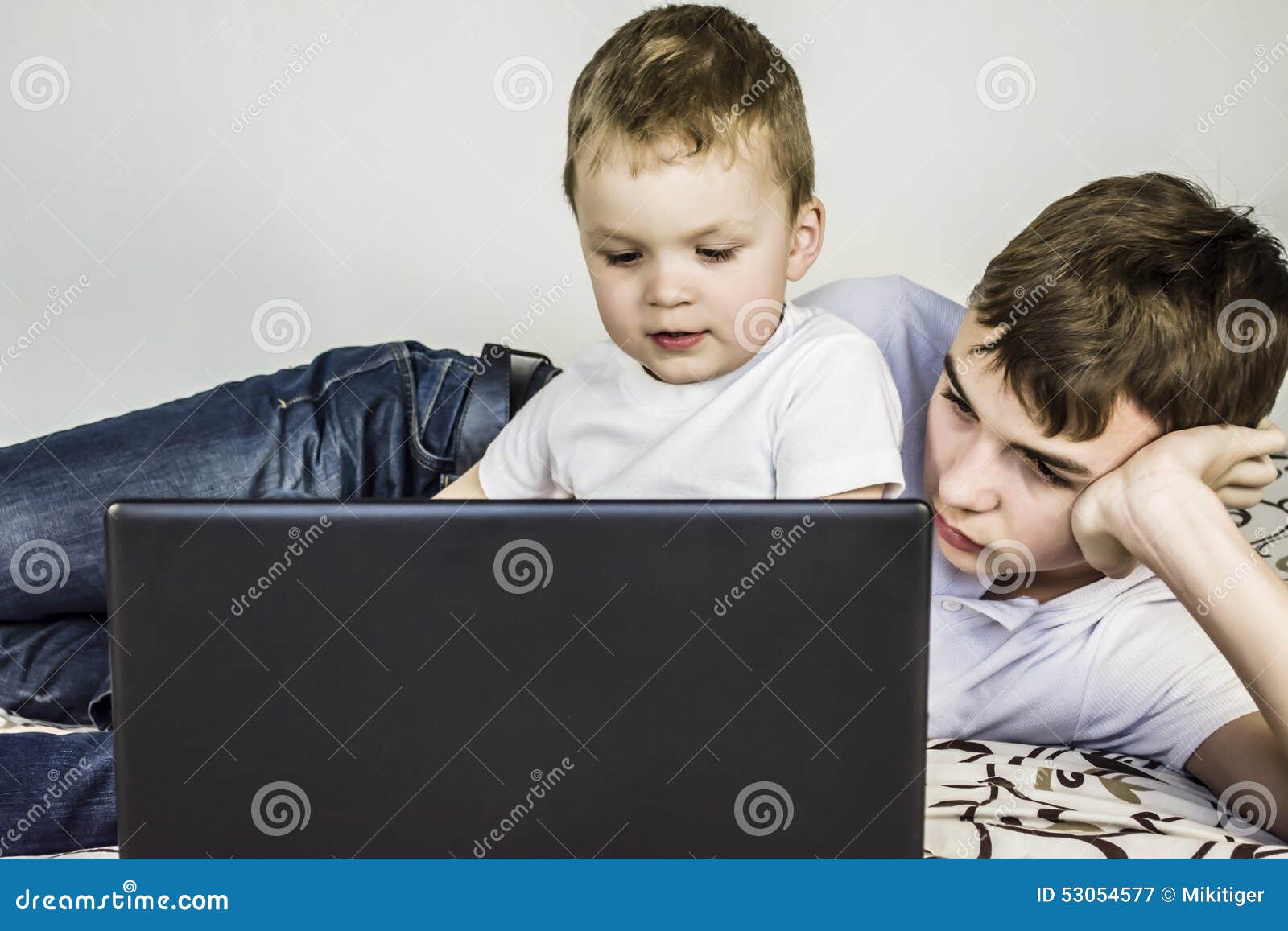 Two brothers stock image. Image of brothers, laptop, watch - 53054577