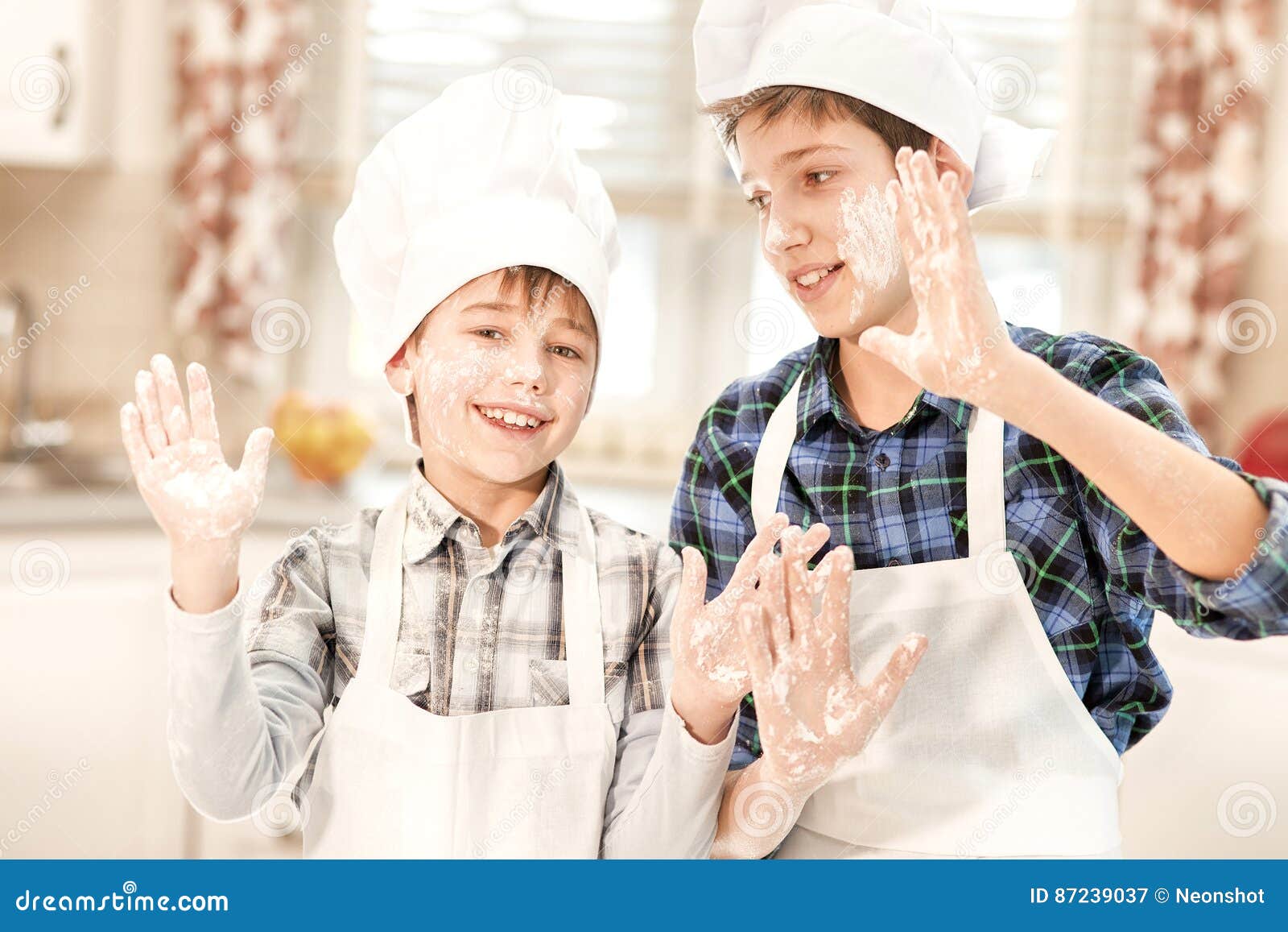 Two brothers in cook hats. stock image. Image of love - 87239037