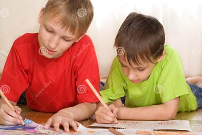 Two brothers draw stock image. Image of looking, child - 16380035