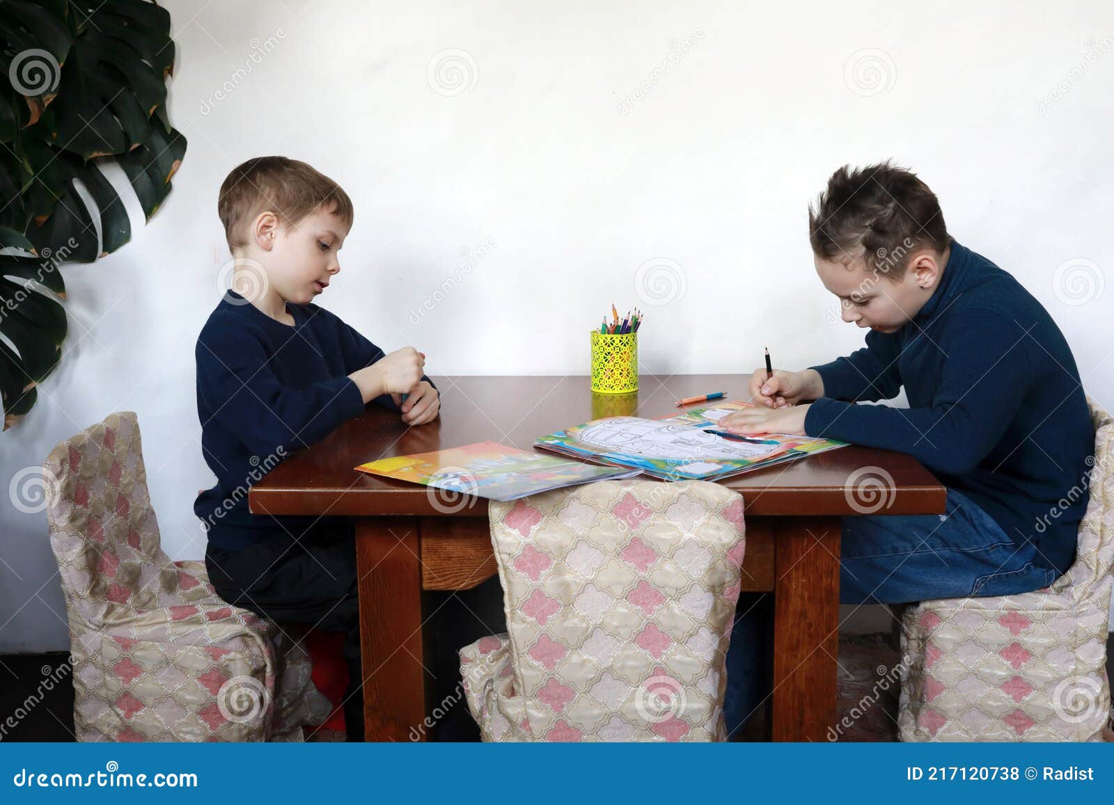 Two Brothers Draw with Pencils Stock Photo - Image of friends, paper ...