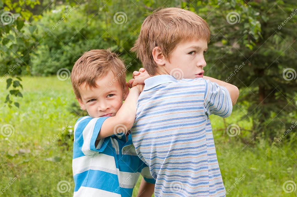 Two brothers are fighting. stock image. Image of russia - 14795119