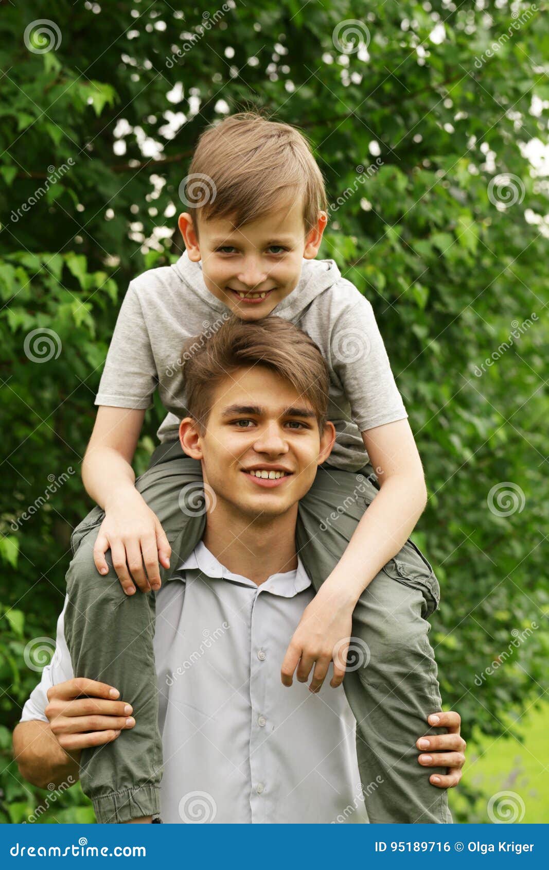 Two Brothers Have Fun in the Park - Summer Time Stock Photo - Image of ...