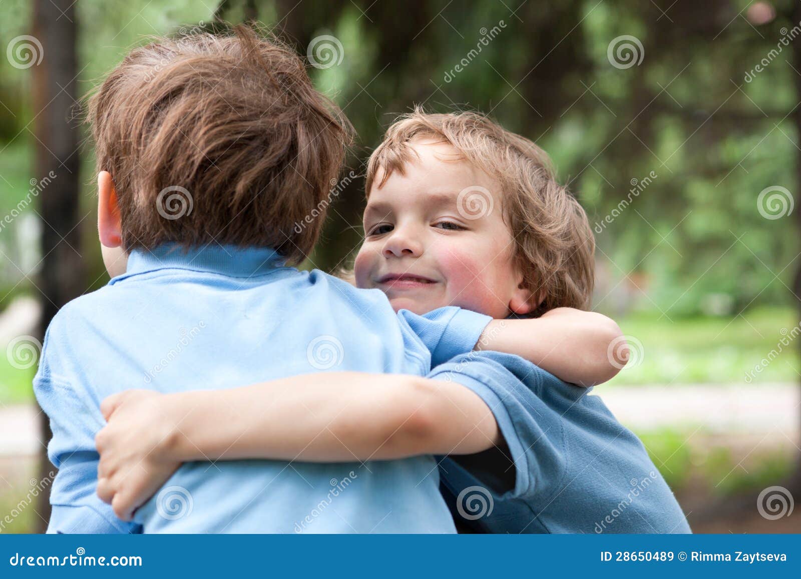 Two Brothers Hugging in Park Stock Image - Image of street, smile: 28650489