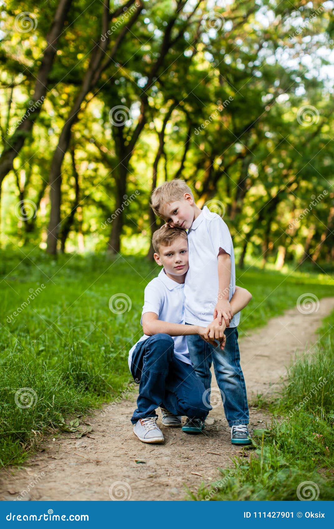 Two brothers outdoors stock image. Image of children - 111427901