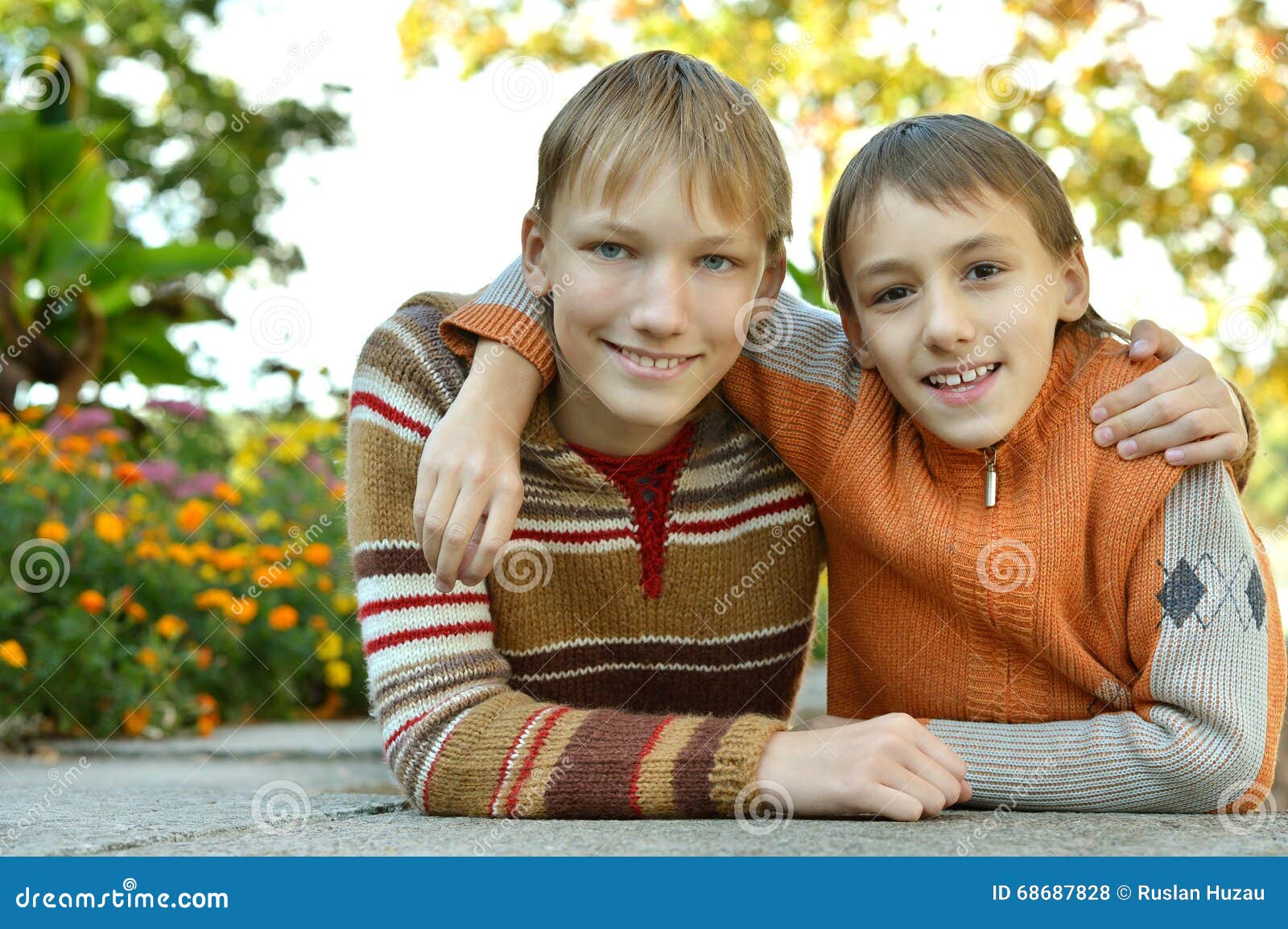 Two brothers in park stock photo. Image of happy, leisure - 68687828