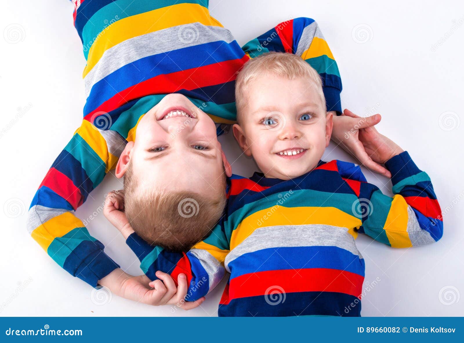 Two Brothers Play,have Fun,make Friends.Children Dressed in the Same ...