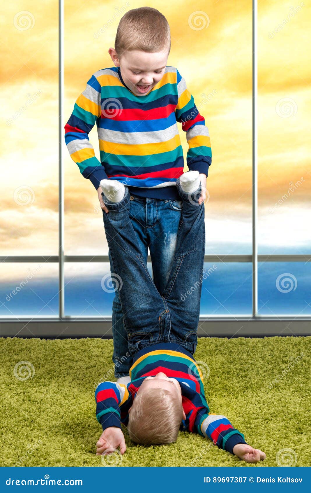 Two Brothers Play,have Fun,make Friends.Children Dressed in the Same ...