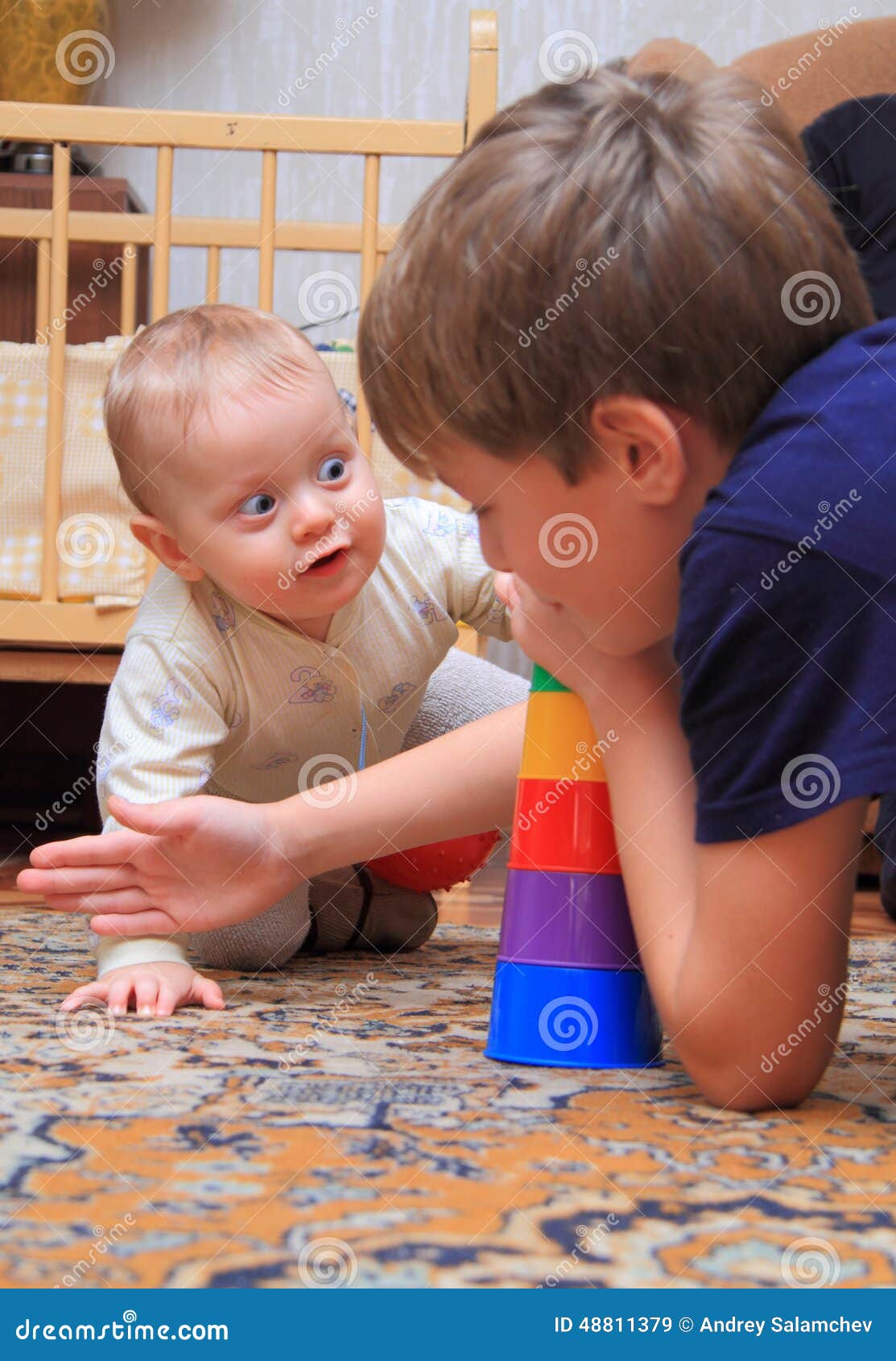 Two brothers play at home stock image. Image of baby - 48811379