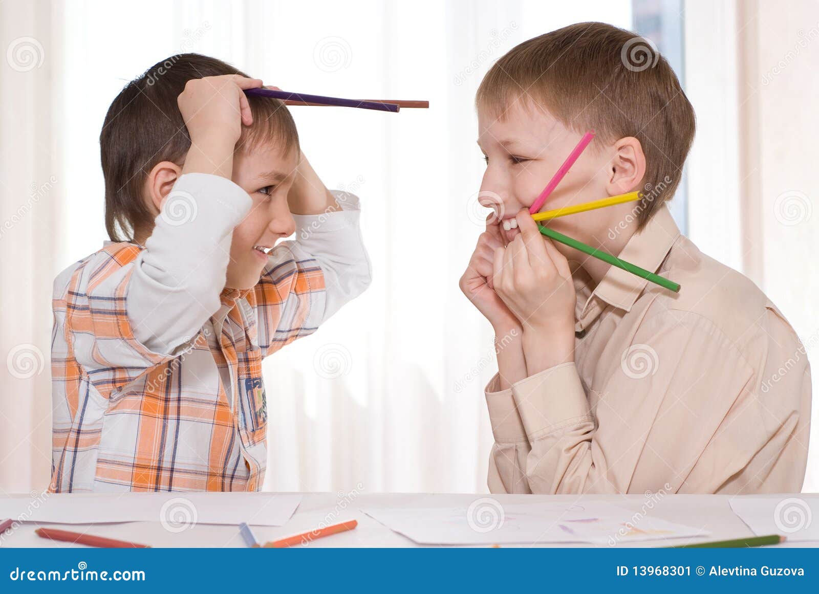 Two brothers play with pen stock image. Image of game - 13968301