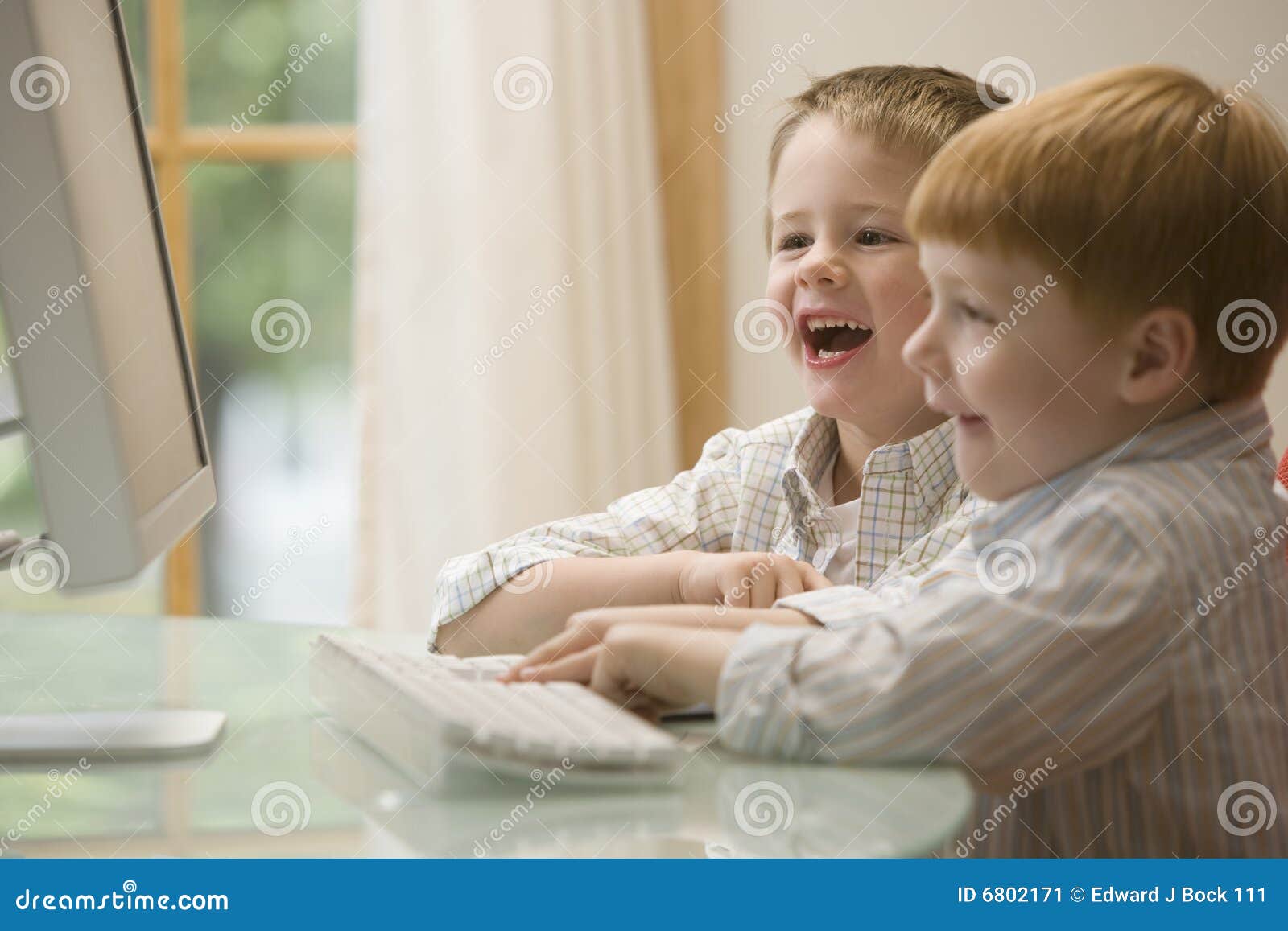 Two Brothers Playing Computer Games Stock Image - Image of learning ...