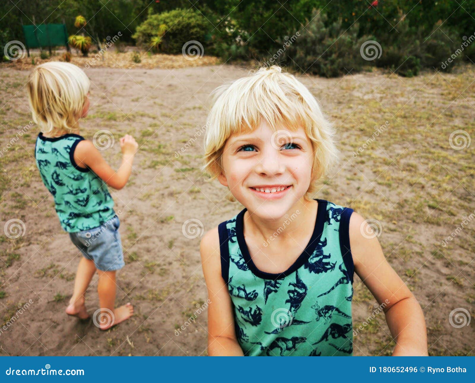 Two Brothers Playing Outdoors Stock Photo - Image of company, childhood ...