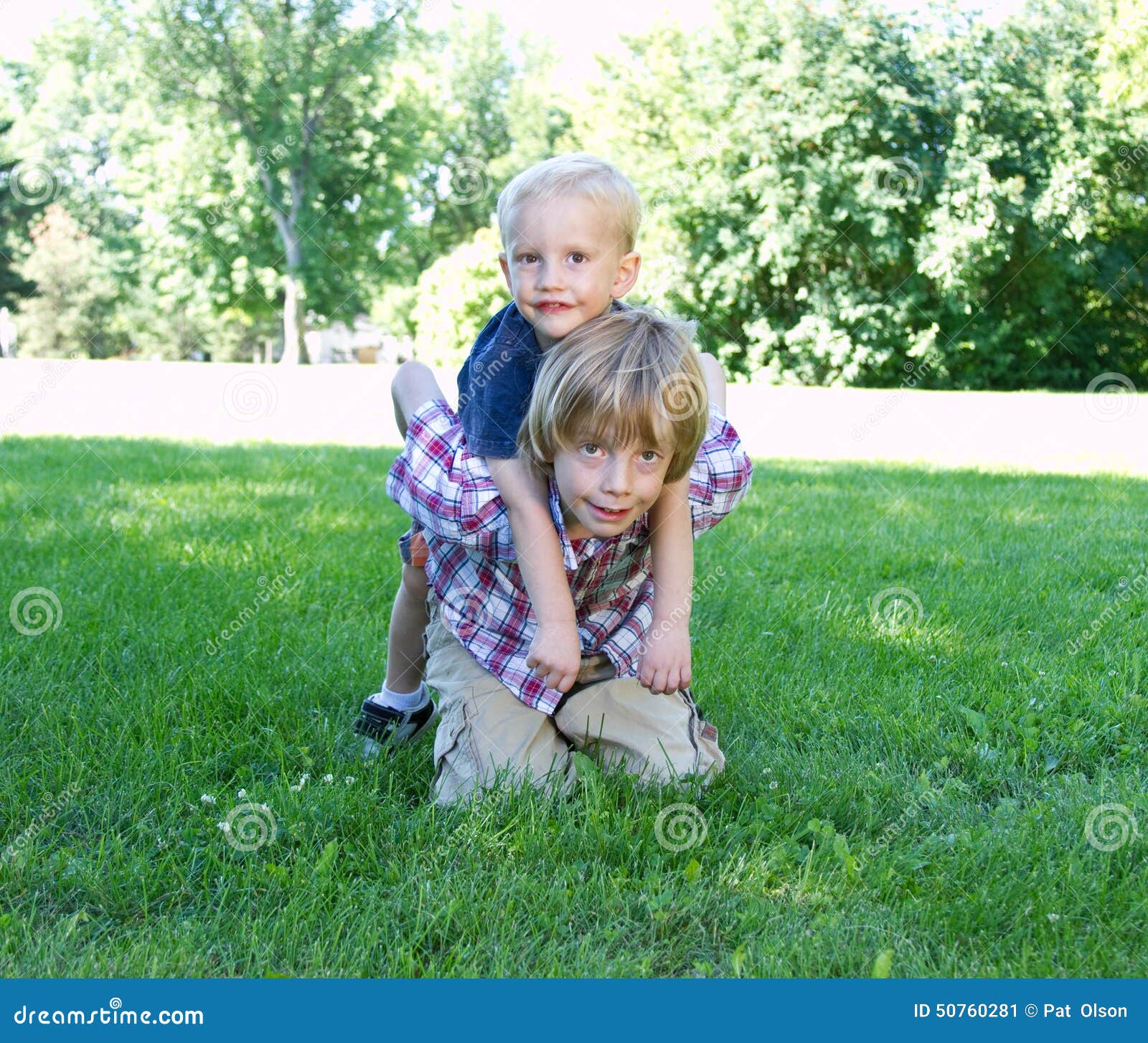 Two Brothers Playing in Park Stock Image - Image of happiness, rough ...