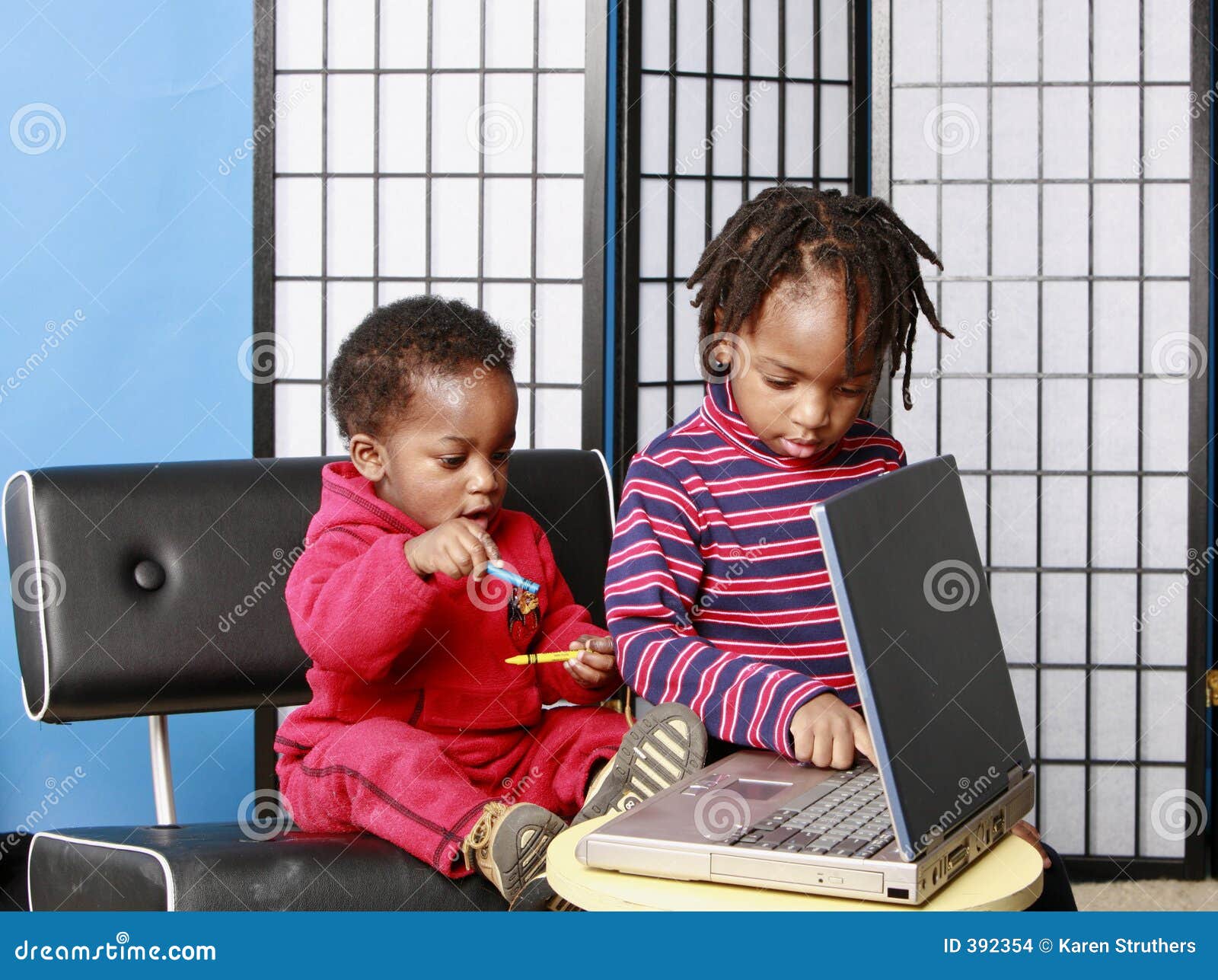 Two Brothers Playing with a PC Stock Photo - Image of family, cute: 392354