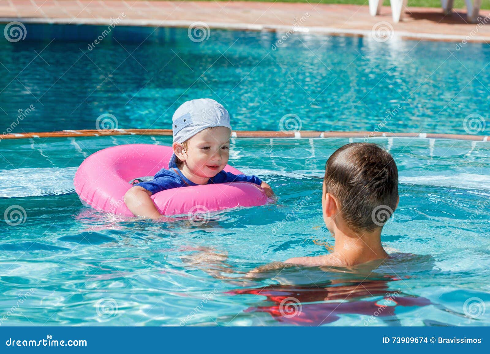 Two Brothers Playing in the Pool Stock Photo - Image of pistol ...