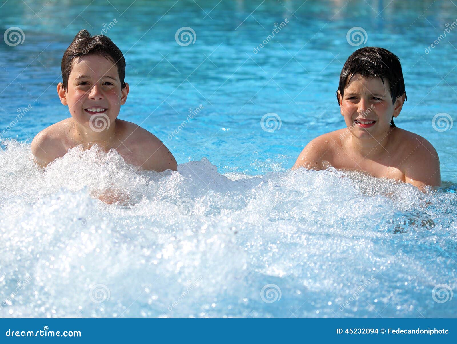 Two Brothers Playing in the Pool in Summer Stock Photo - Image of ...