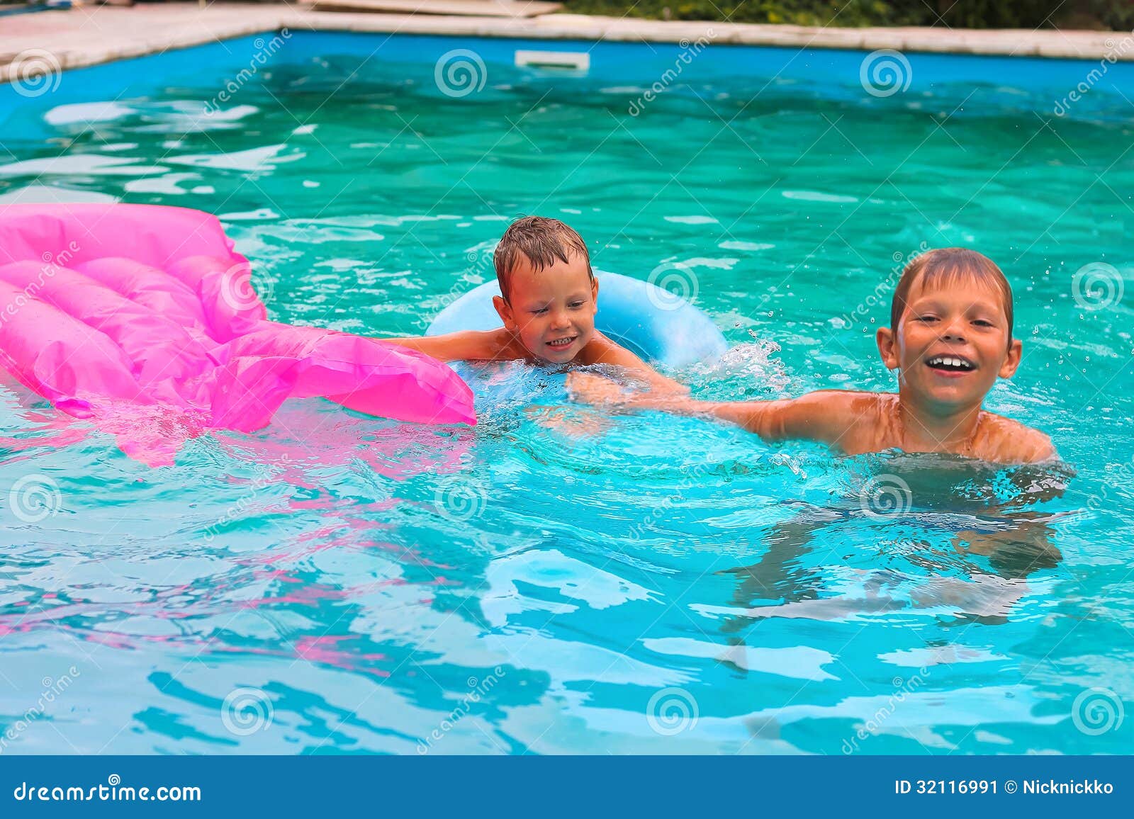 Two brothers in the pool stock image. Image of playing - 32116991