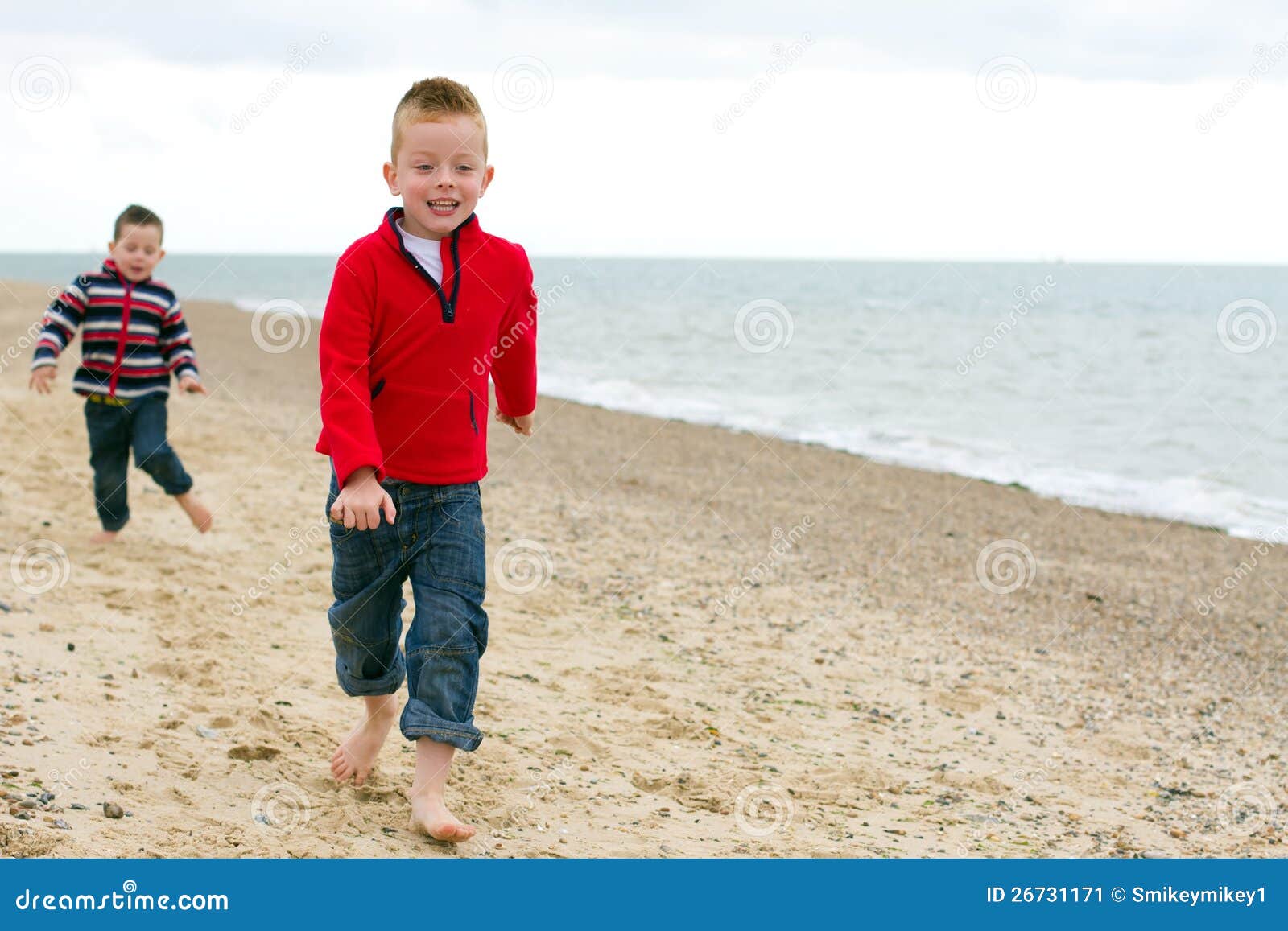 Two brothers running stock image. Image of blue, blond - 26731171