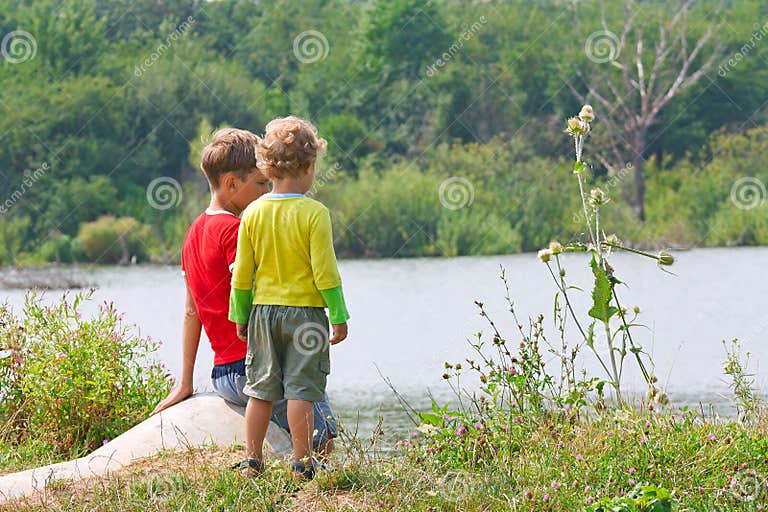 Two Brothers are Sitting Outdoors Stock Photo - Image of preschooler ...
